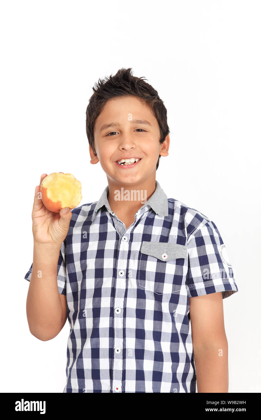 Boy eating an apple hi-res stock photography and images - Alamy