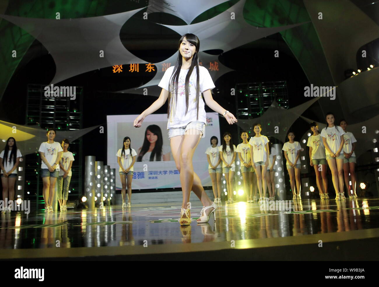 Chinese college girl students, participants of an etiquette contest ...