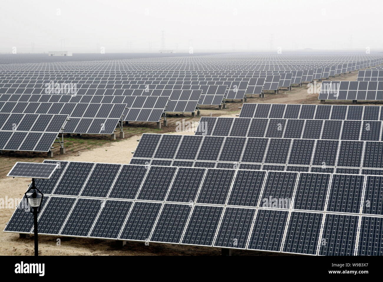Solar panels are seen at a 10-megawatt (MW) utility-scale solar power ...