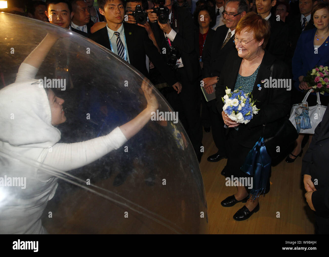 Finnish President Tarja Halonen (R) watches performance at the Finland ...