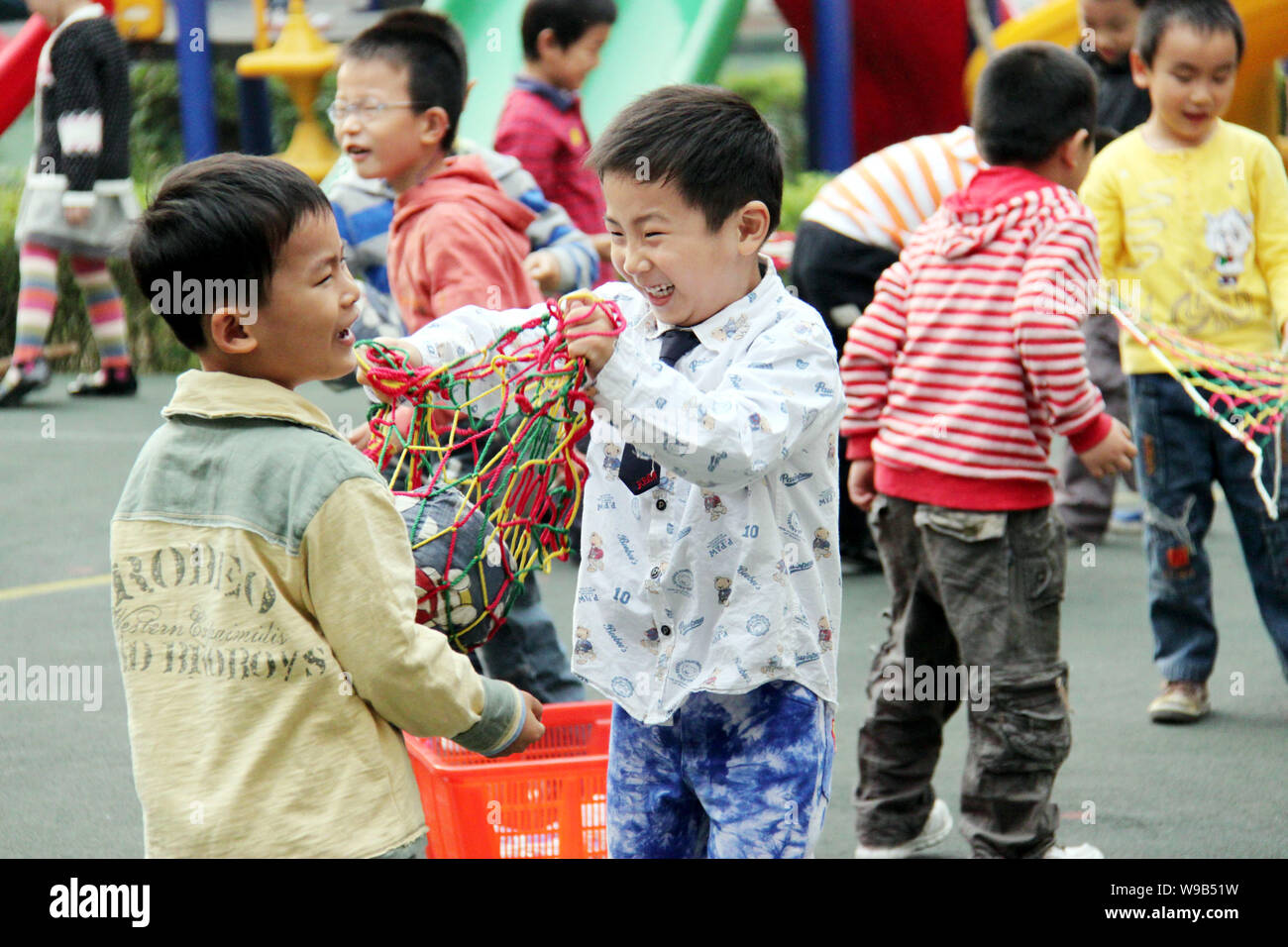 --FILE--Chinese kids play games at a kindergarten in Nanjing city, east ...