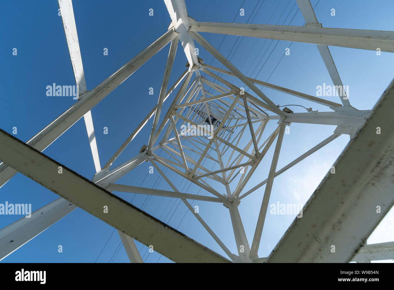 Transmission tower, view from below. Overhead pylon power line tower ...