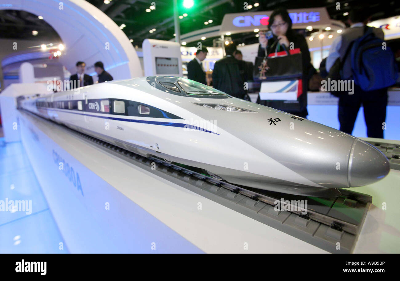 Visitors look at the model of a CRH (China Railway High-speed) 380A ...