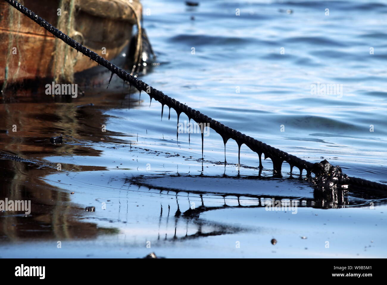 Oil slick boat hi-res stock photography and images - Alamy