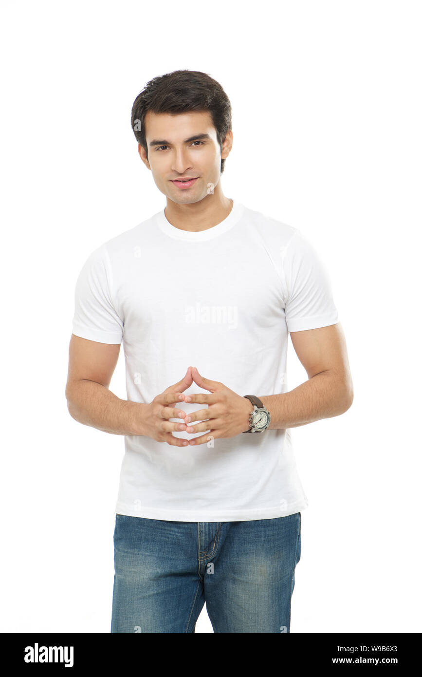 Portrait of a young man standing Stock Photo - Alamy