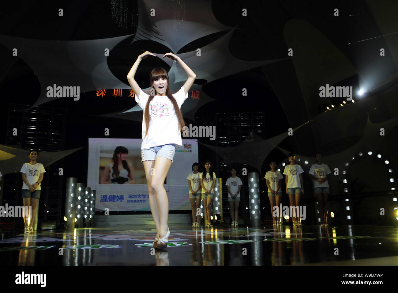 Chinese college girl students, participants of an etiquette contest ...