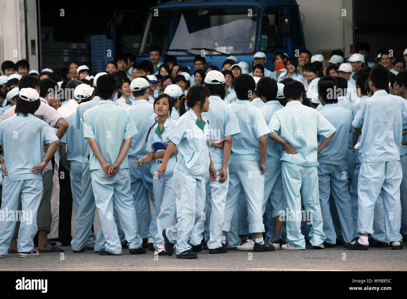 Chinese factory workers strike hi-res stock photography and images - Alamy