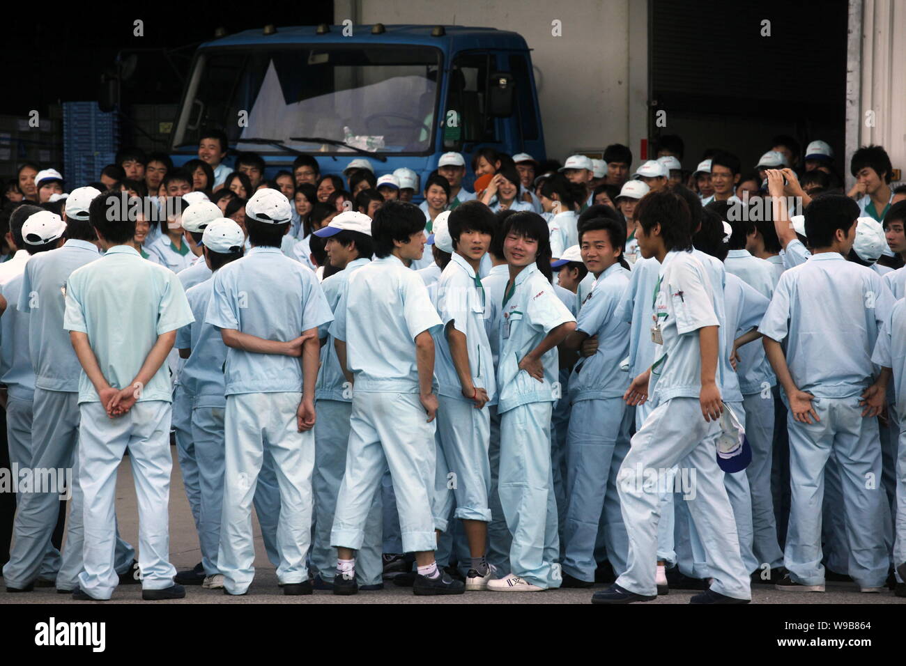 Chinese factory workers strike hi-res stock photography and images - Alamy