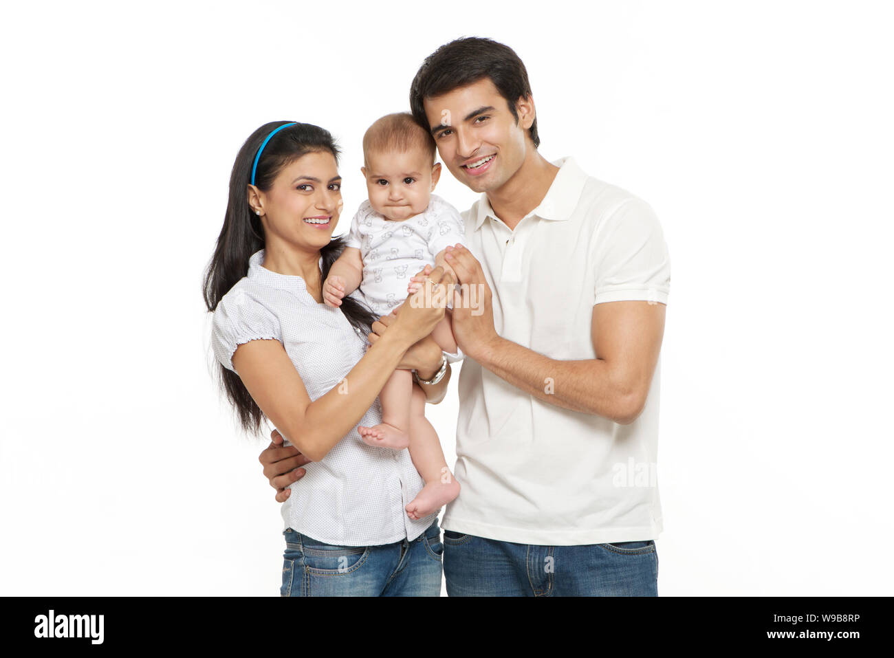 Parents with their baby boy Stock Photo - Alamy