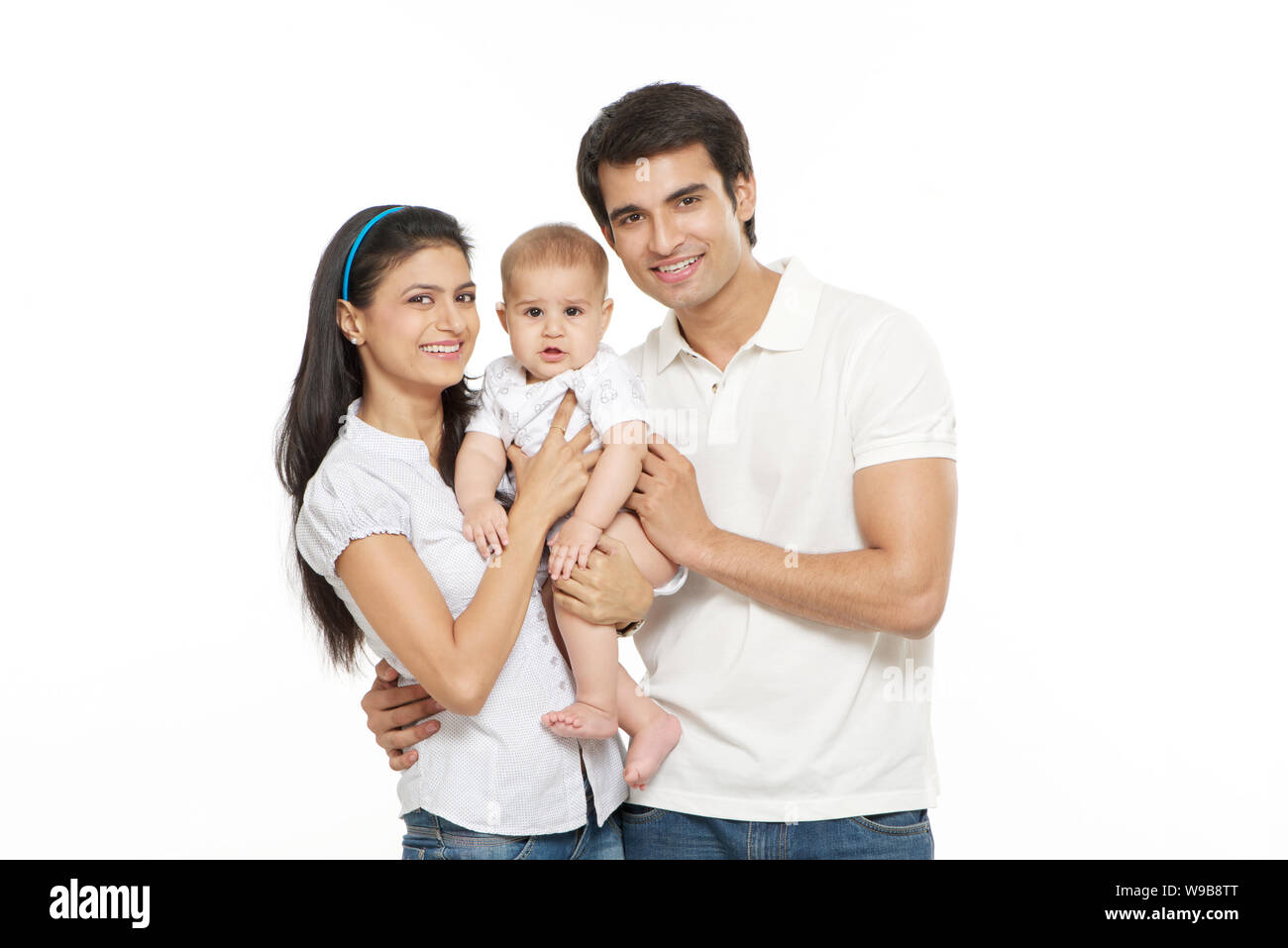 Parents with their baby boy Stock Photo - Alamy