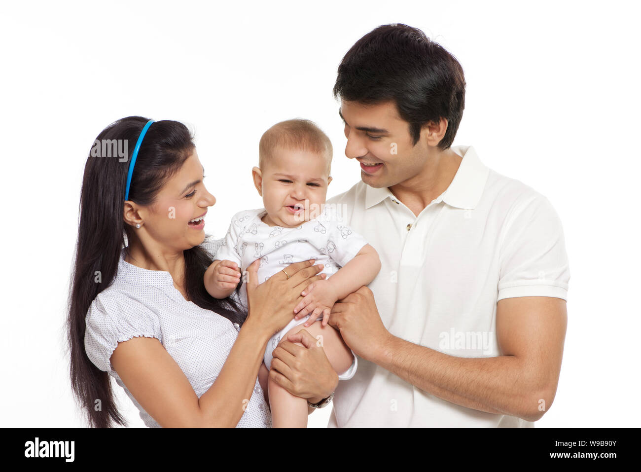 Parents with their baby boy Stock Photo - Alamy