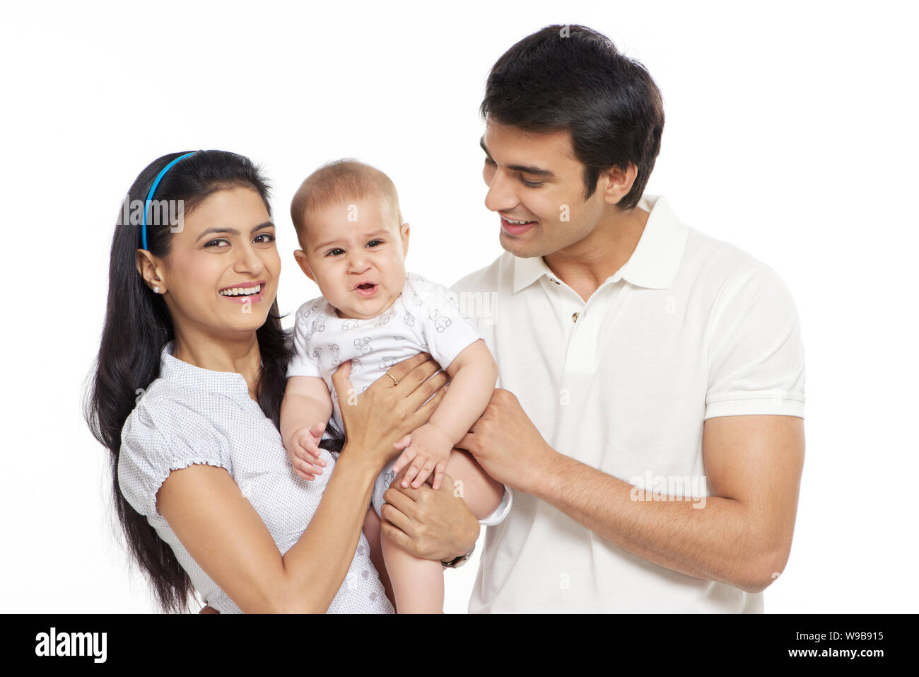 Parents with their baby boy Stock Photo - Alamy