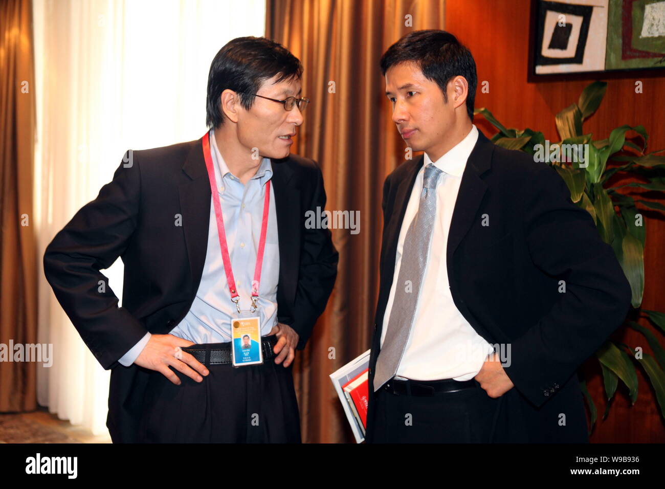 Levin Zhu (Zhu Yunlai), left, President and Chief Executive Officer of China International ...