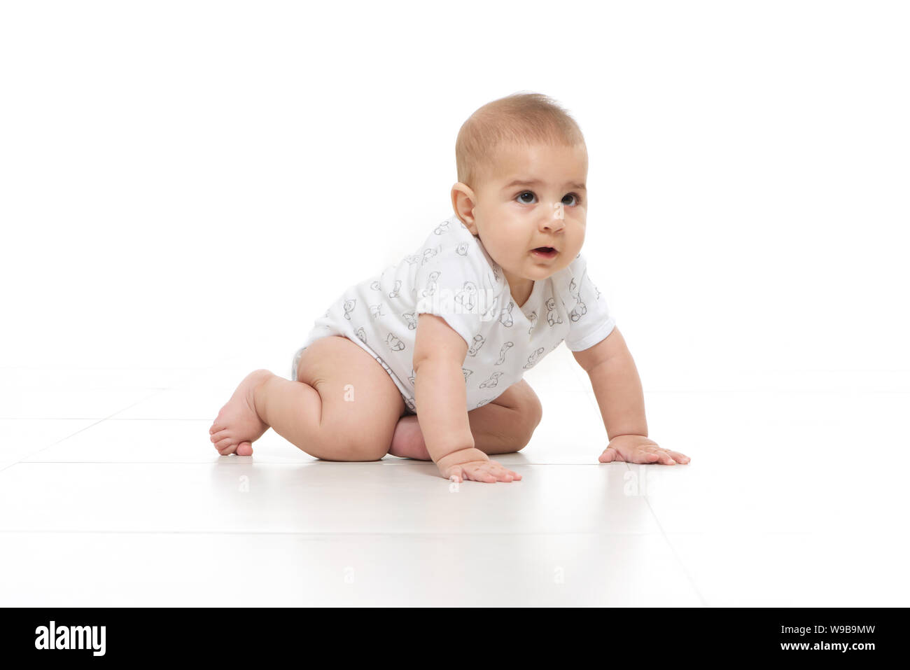 Baby infant crawling on floor hi-res stock photography and images - Alamy