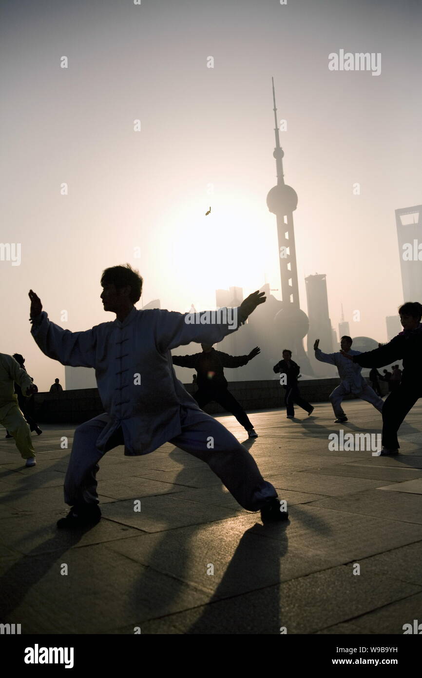 --FILE-- A man practises Tai-chi (Taiji, Tai Chi, shadow-boxing) on the ...