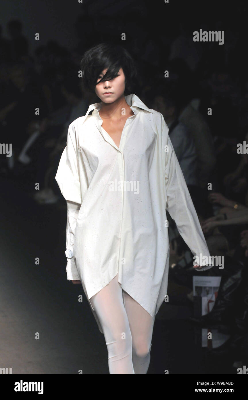 A model parades to show the new collections in the Uma Wang fashion ...