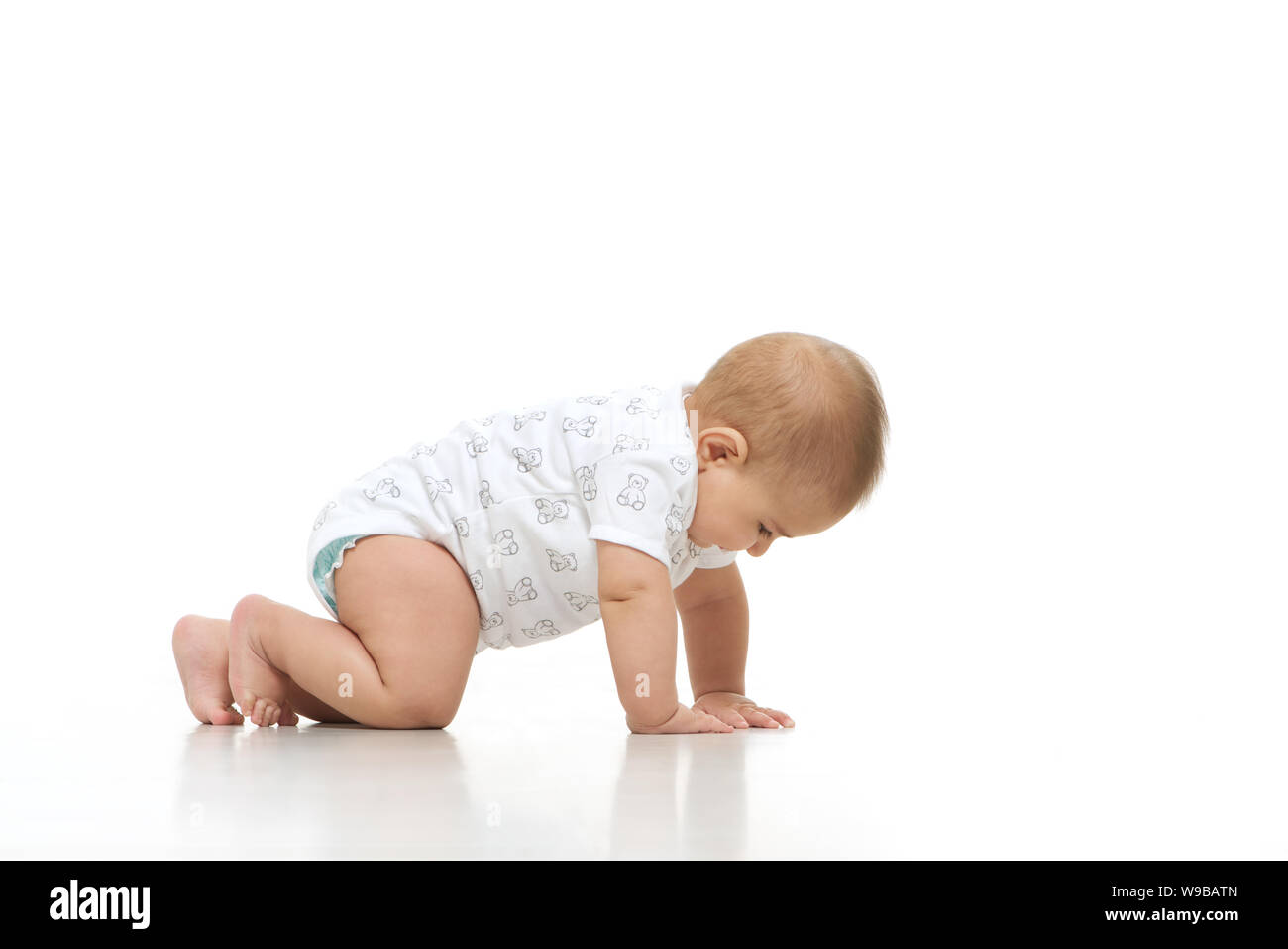 Indian infant crawling hi-res stock photography and images - Alamy