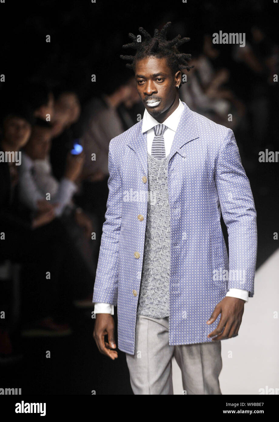 A model parades to show the new collections in the Seven Days fashion ...