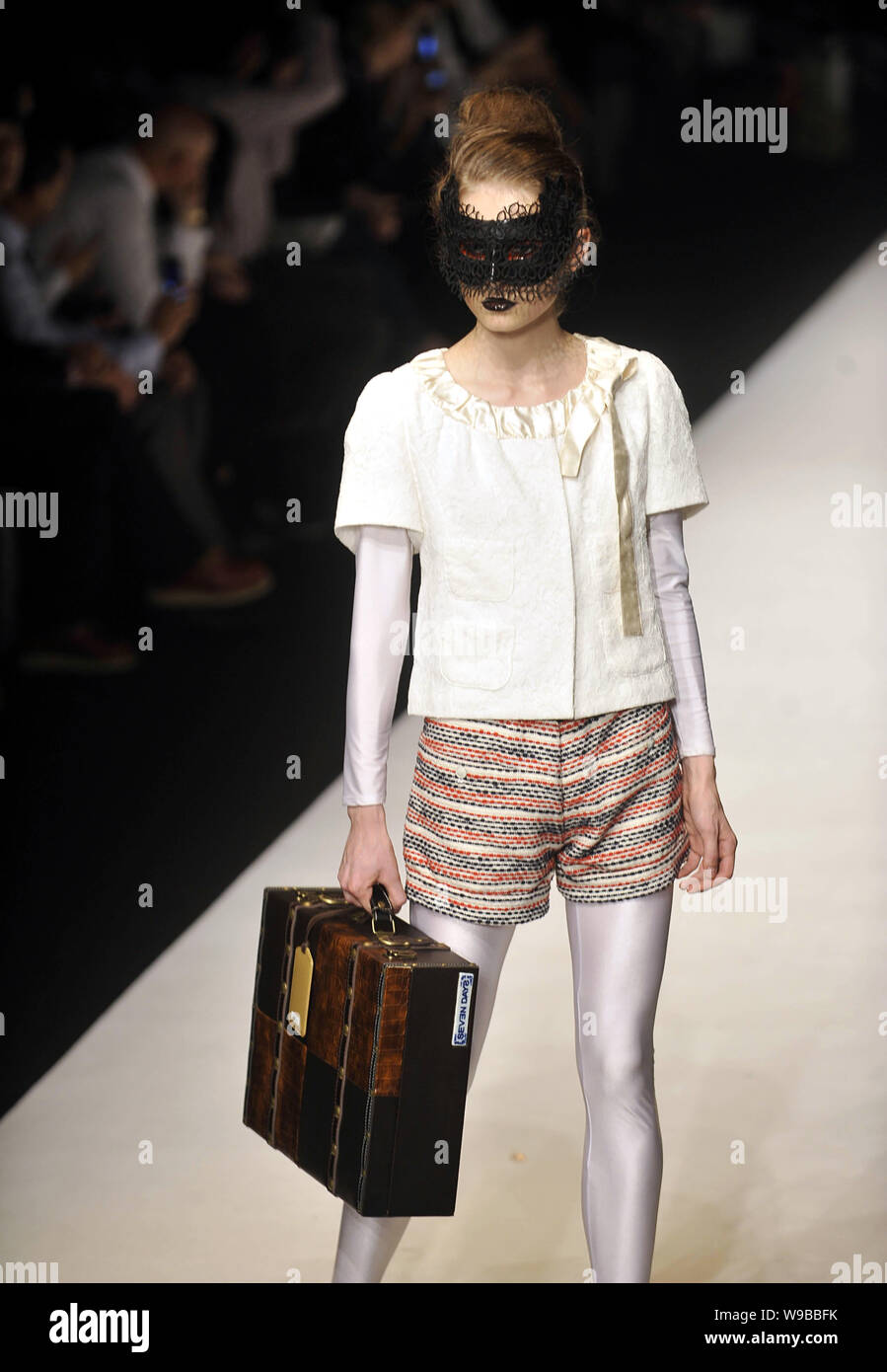 A model parades to show the new collections in the Seven Days fashion ...