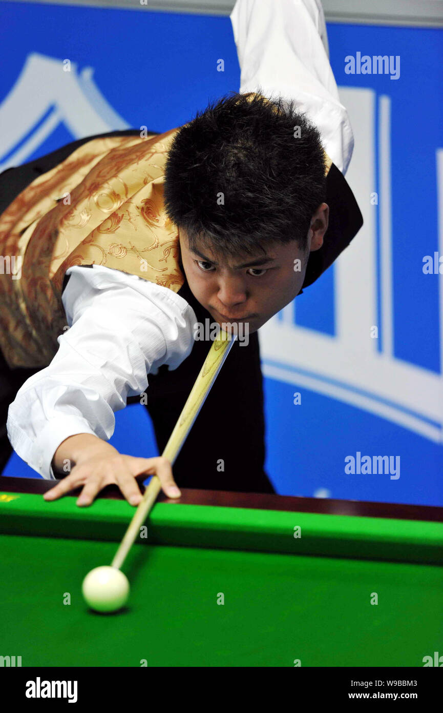 Chinas Liang Wenbo competes in the mens snooker team final at the 16th ...