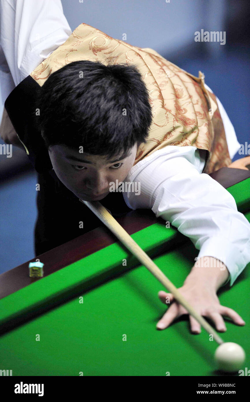 Chinas Ding Junhui competes in the mens snooker team final at the 16th ...