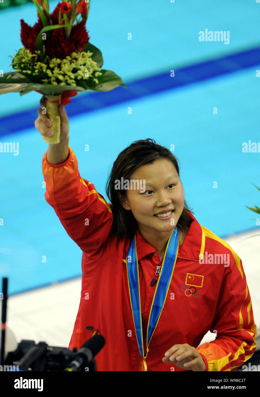 Chinas Zhao Jing celebrates after winning and breaking the Asian record ...
