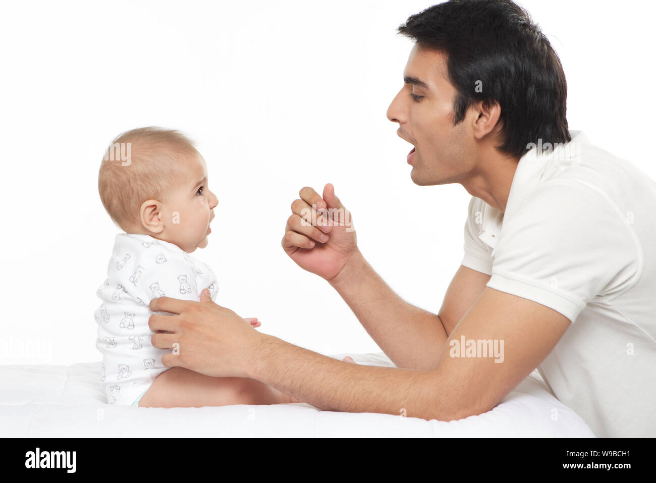 Father consoling his baby Stock Photo - Alamy