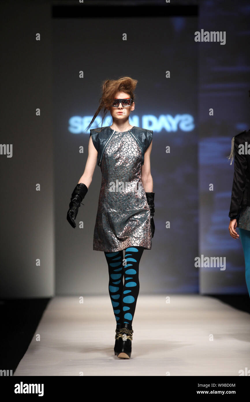 A model parades to show the new collections in the Seven Days fashion ...