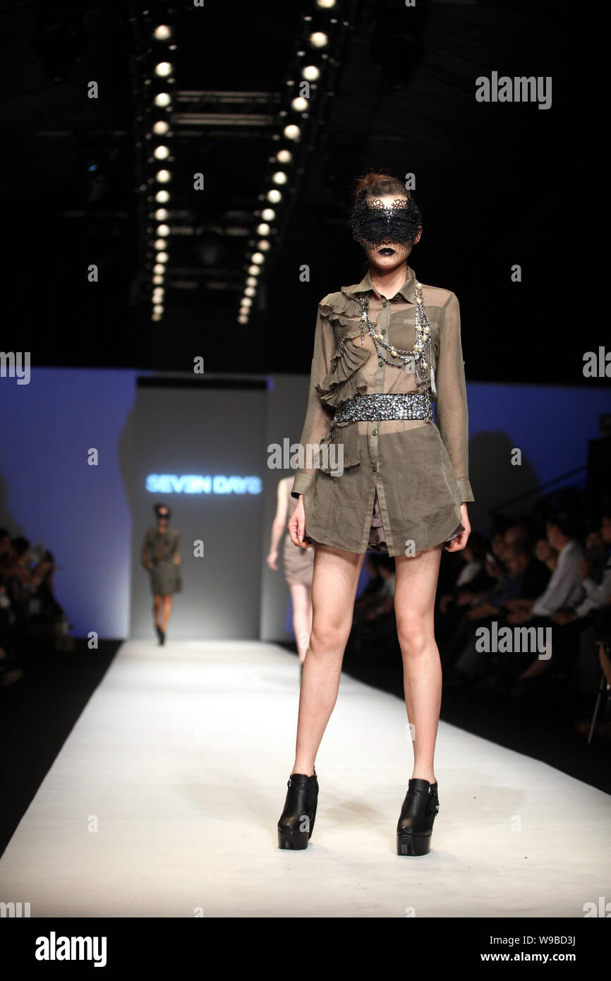 A model parades to show the new collections in the Seven Days fashion ...