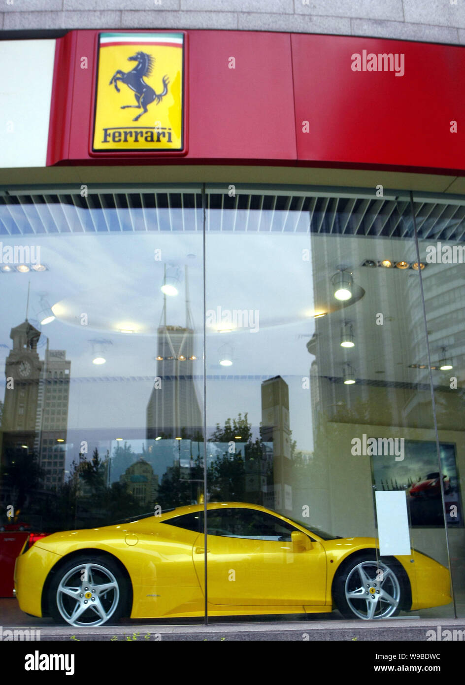 A Ferrari 458 Italia sports car is displayed in a Ferrari store in ...