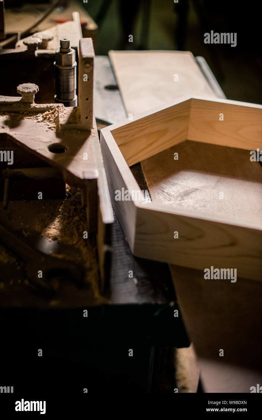 Wooden details and tools in carpentry workshop interior, woodwork in ...
