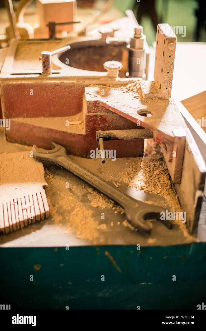 Wooden details and tools in carpentry workshop interior, woodwork in ...