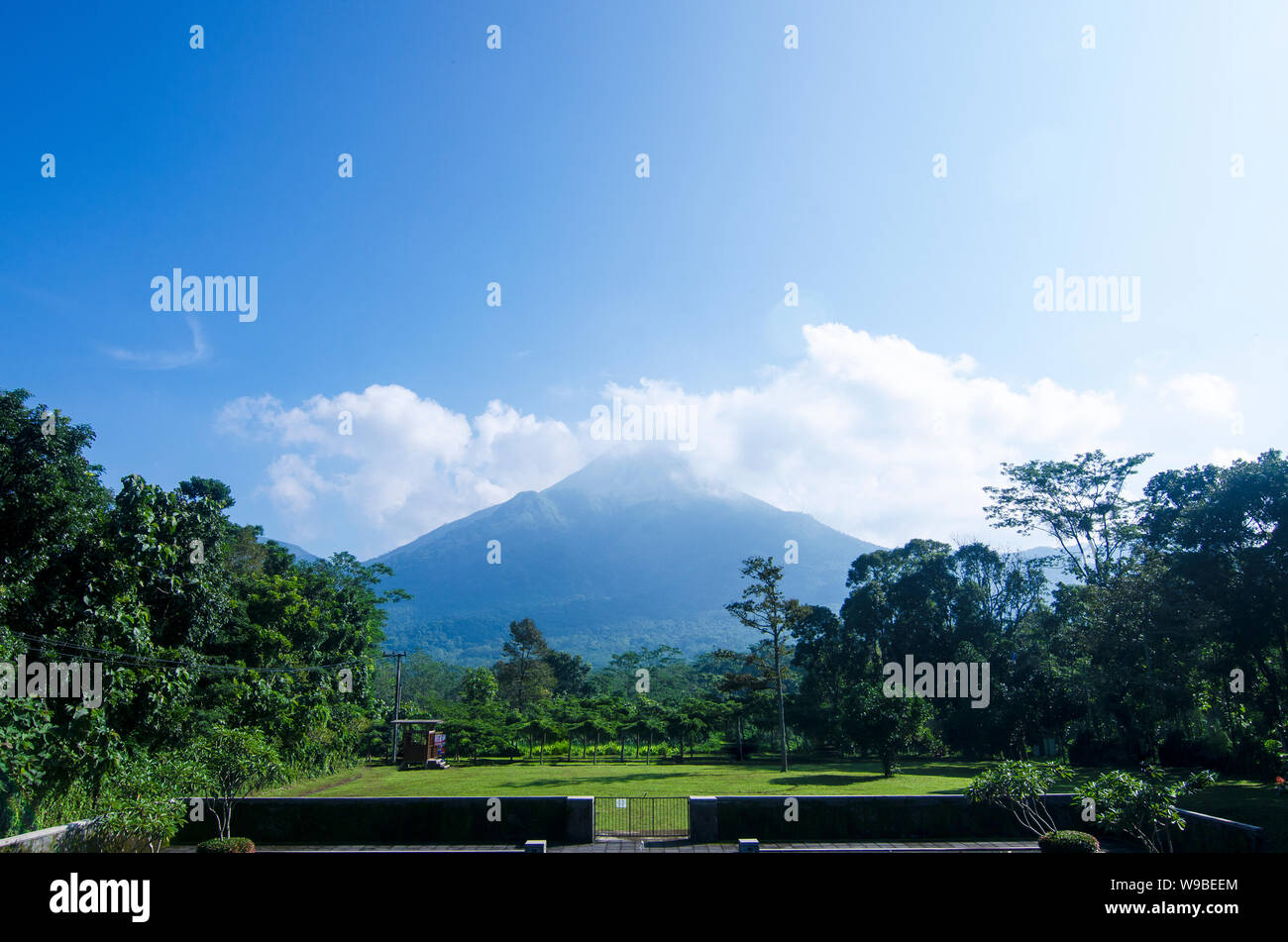 A yard with Mount Penanggungan view behind Ubaya Training Center Stock ...