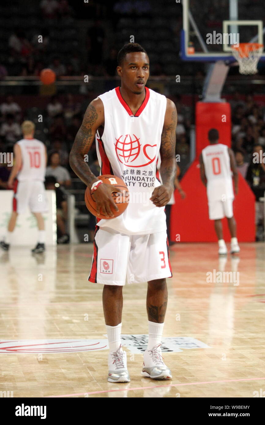 NBA basketball player Brandon Jennings of the Milwaukee Bucks warms up ...