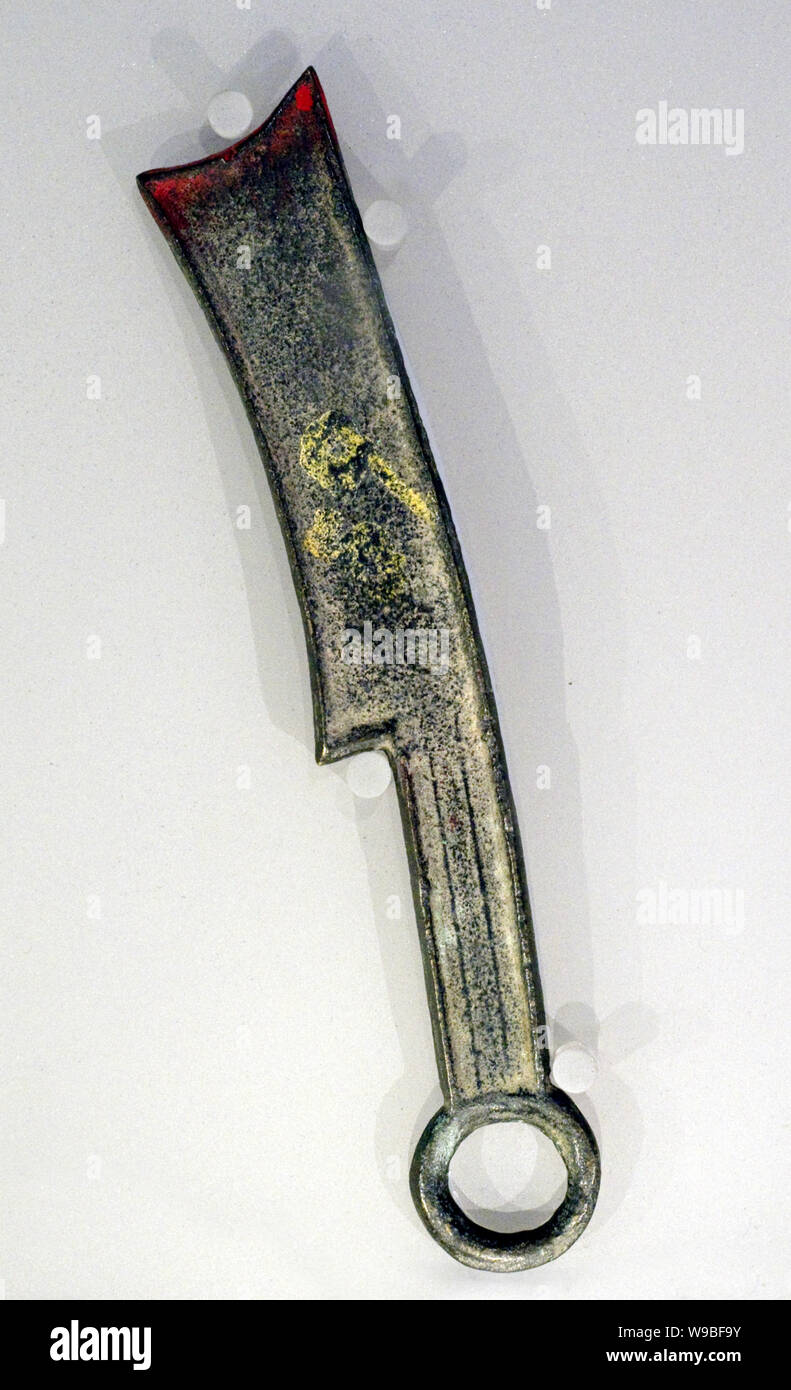 A knife-shaped cast bronze coin from the Warring States Period (475 BC ...