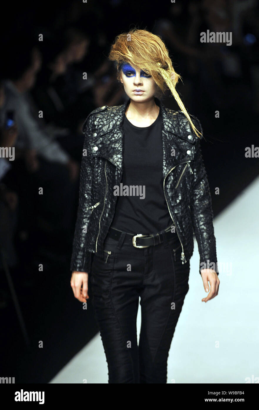 A model parades to show the new collections in the Seven Days fashion ...