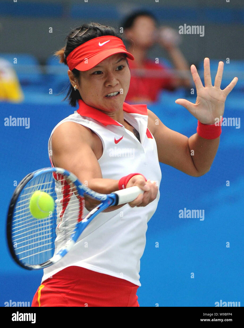 Chinas Li Na competes in the womens tennis team final at the 16th Asian ...