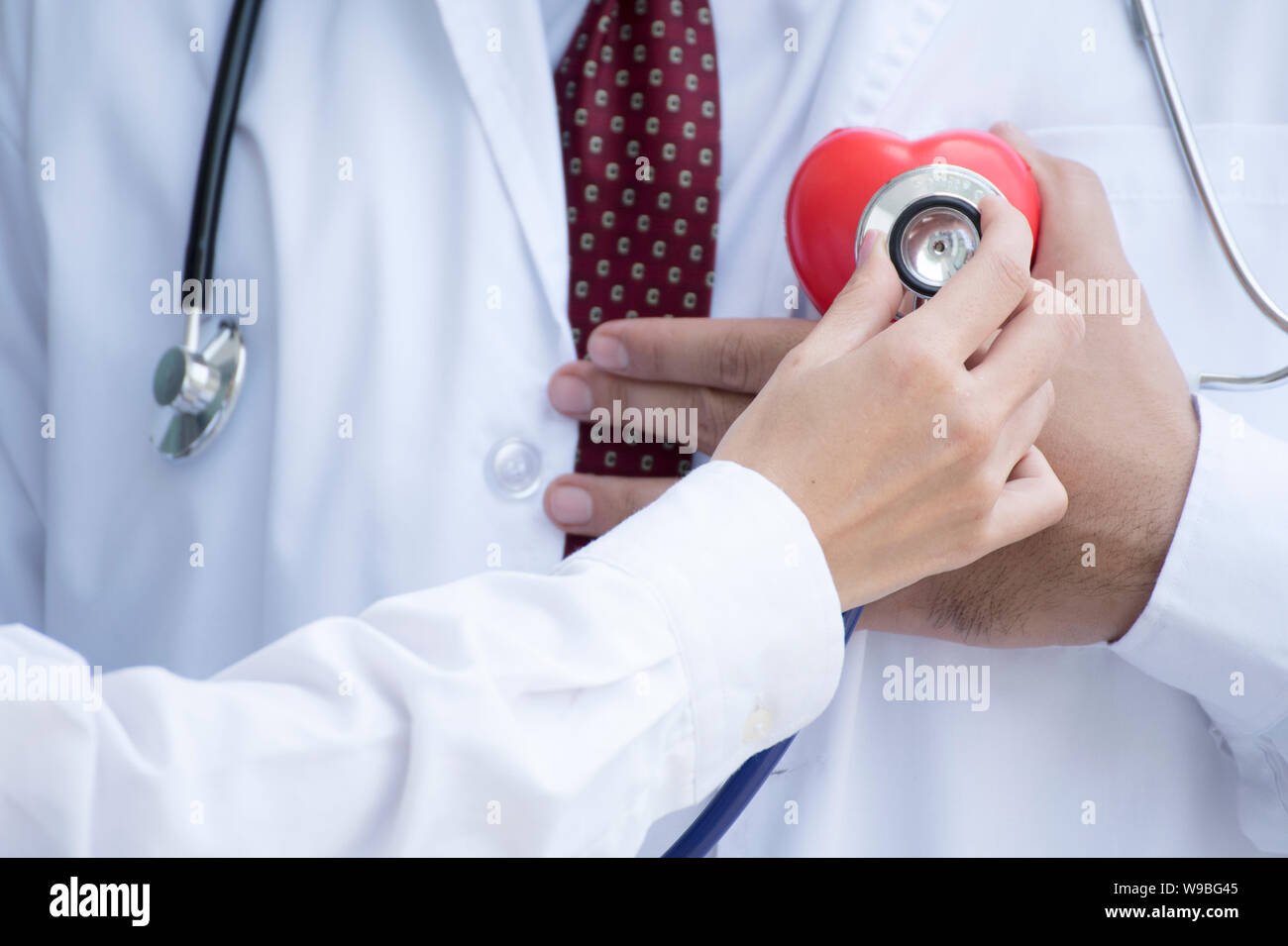 Doctor checking heart rate. Diagnosis by using stethoscope. Healthcare ...