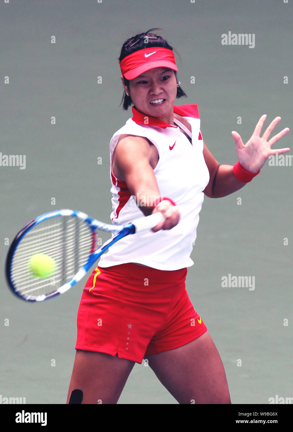Chinas Li Na competes in the womens tennis team final at the 16th Asian ...