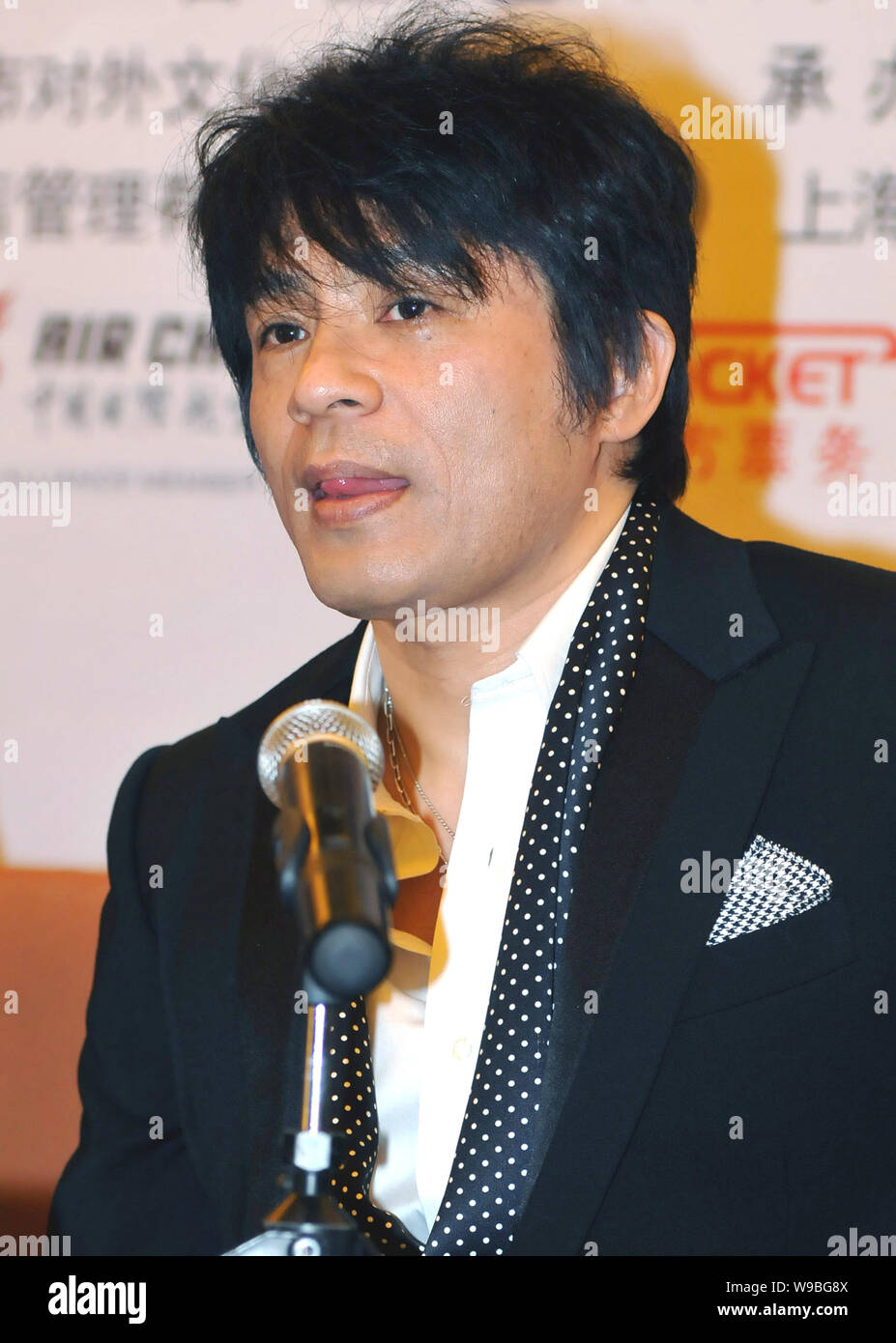 Japanese singer and songwriter Ryo Aska is seen at a press conference ...