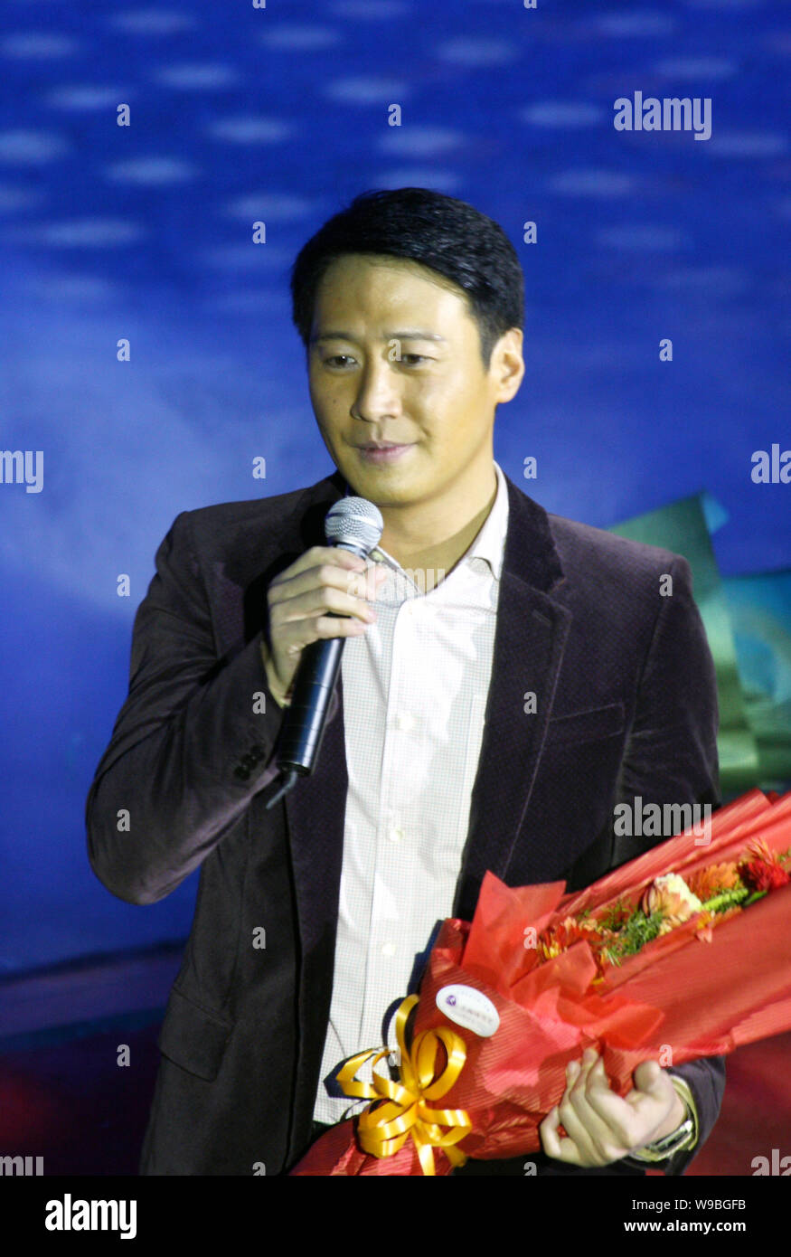 Hong Kong actor and singer Leon Lai performs at a ceremony to celebrate ...