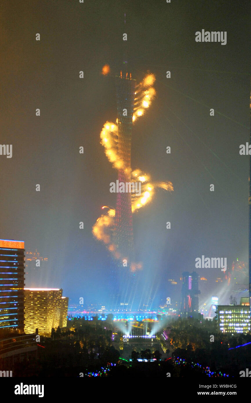 Fireworks explode from Canton Tower during the closing ceremony of the ...