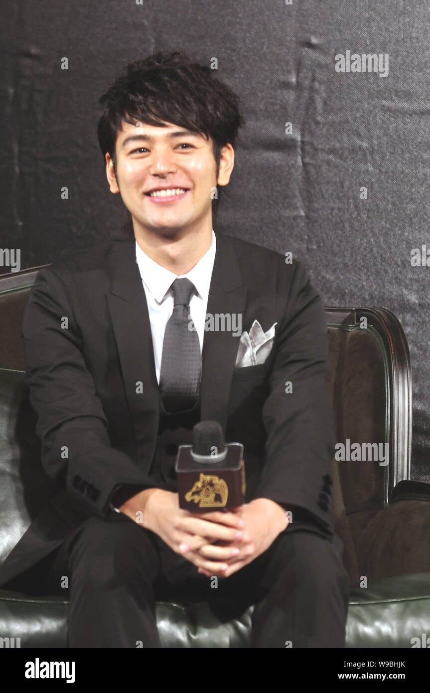 Japanese actor Satoshi Tsumabuki is seen at a press conference to ...