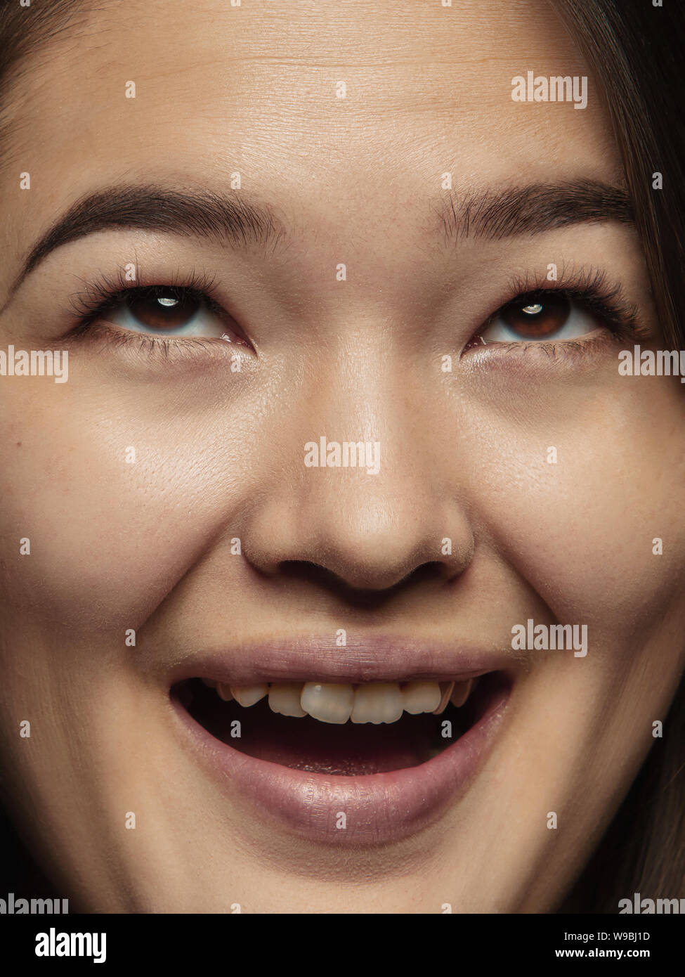 Close up portrait of young and emotional chinese woman. Highly detail ...