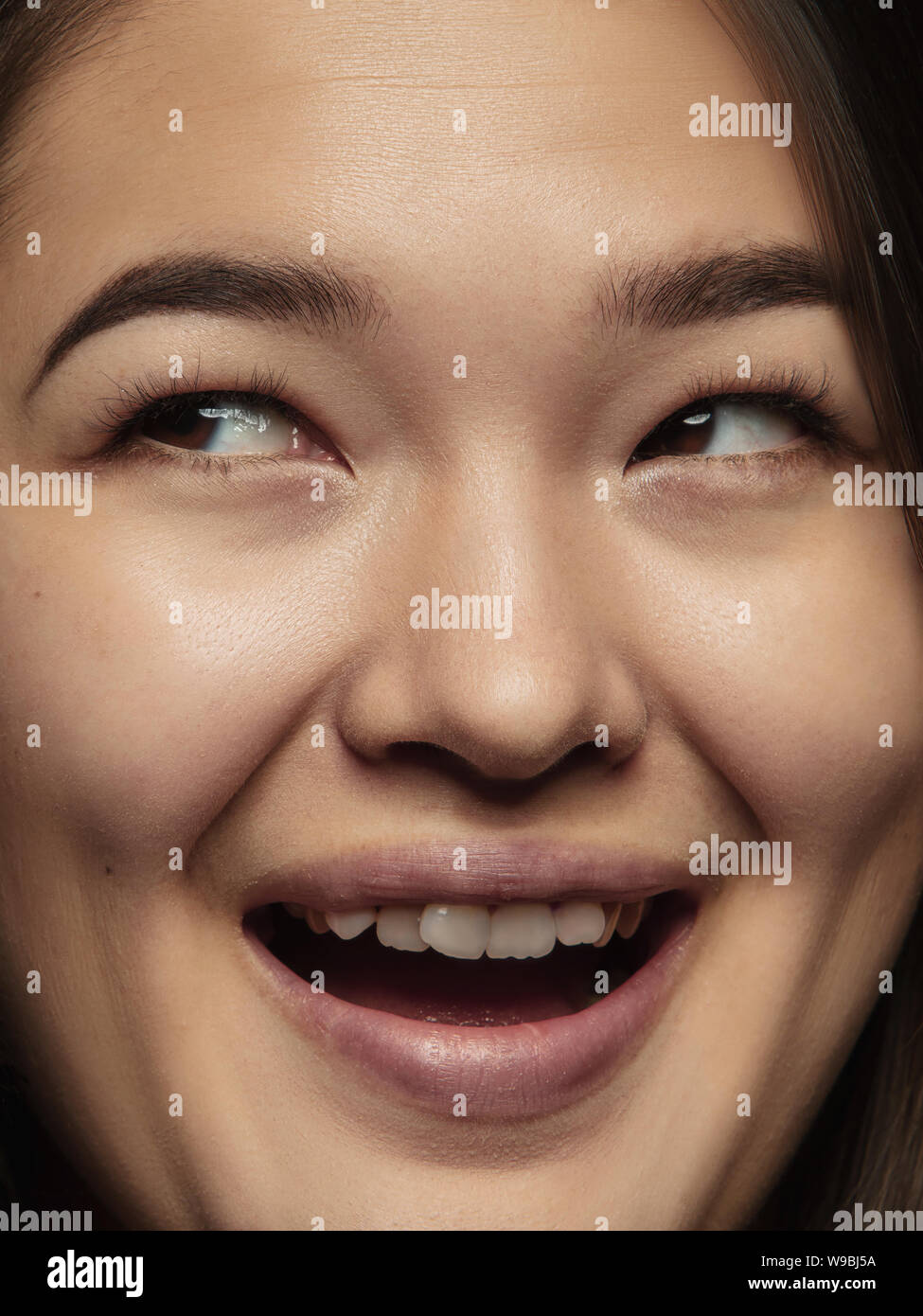 Close up portrait of young and emotional chinese woman. Highly detail ...