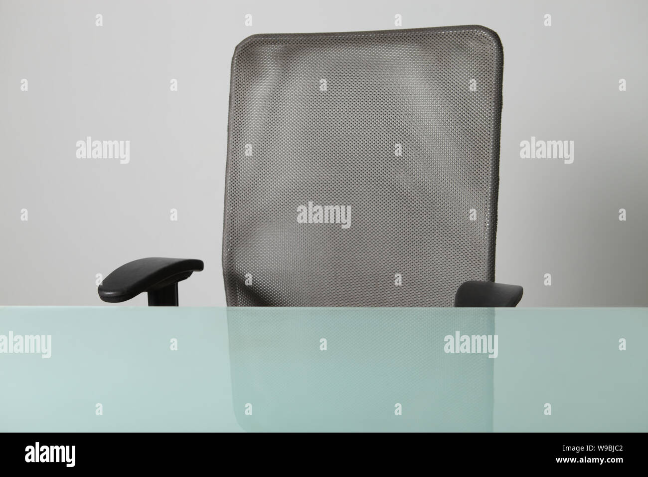 Empty office chair in an office Stock Photo - Alamy