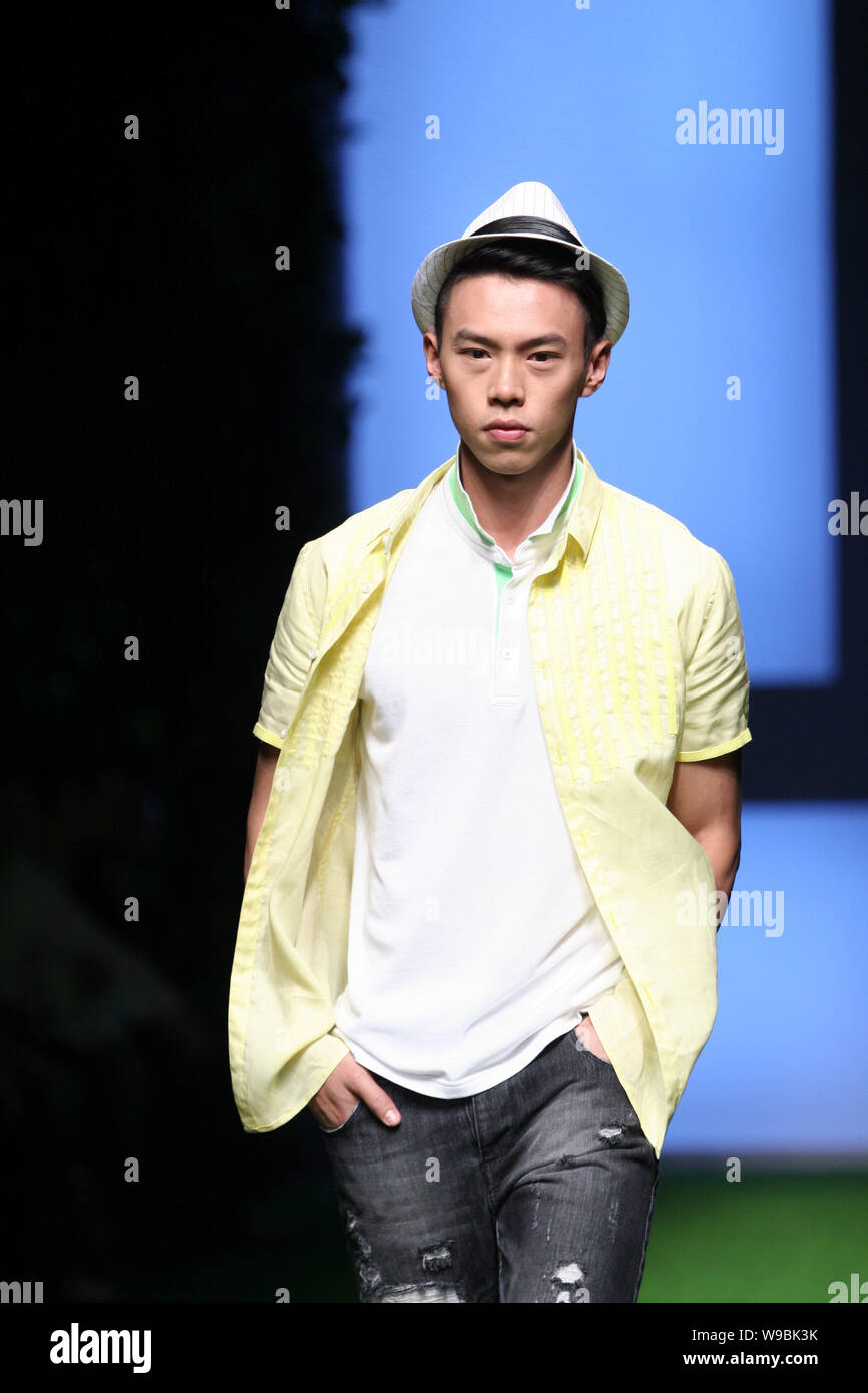 A model parades to show the new collections in the L2 fashion show ...