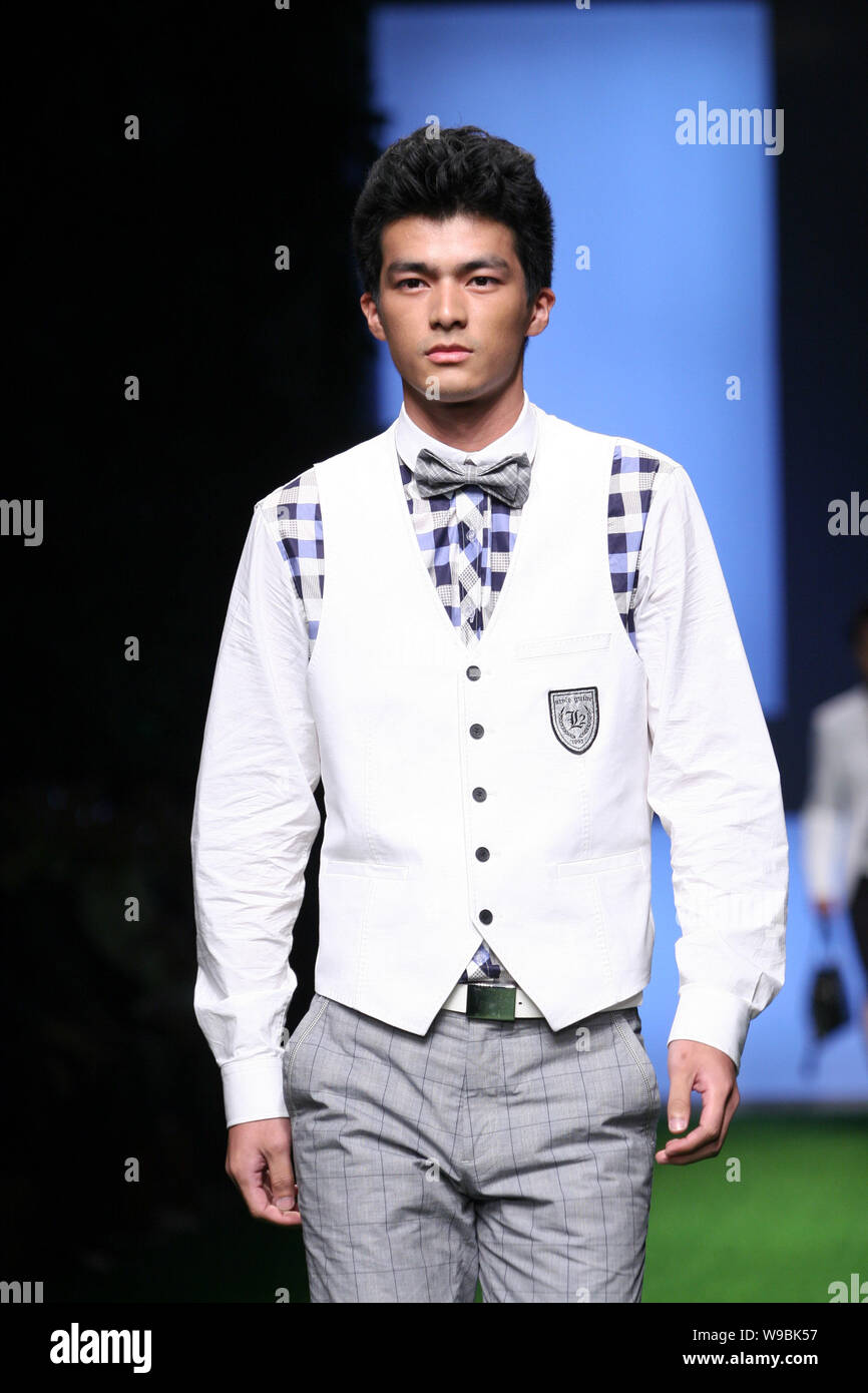 A model parades to show the new collections in the L2 fashion show ...