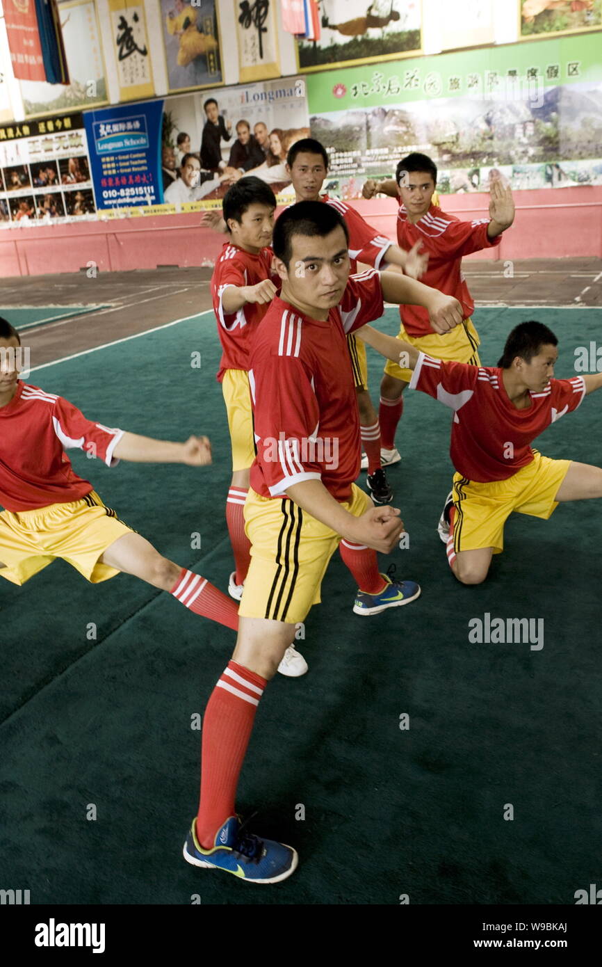 Chinese kungfu football players pose during a training session at the ...