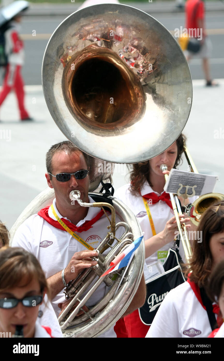 French performers parade to celebrate the Fance Pavilion Day in the ...